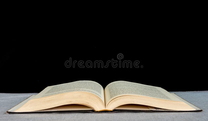 Open Book on Table stock photo. Image of table, literature - 179353912