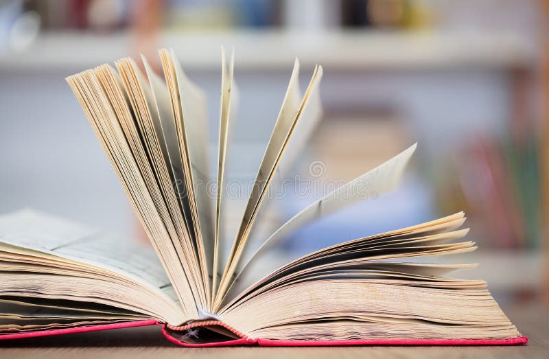 An open book on table stock image. Image of read, open - 196827189