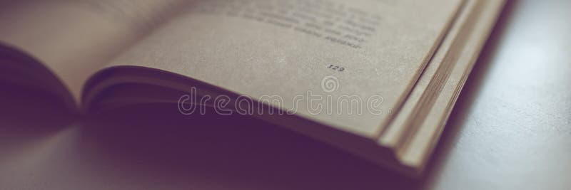 Open Book on the Table. Side View, Closeup Stock Image - Image of side ...