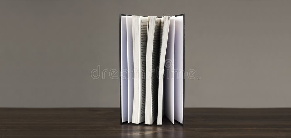 An Open Book is on the Table. Book Upright. Stock Photo - Image of desk ...