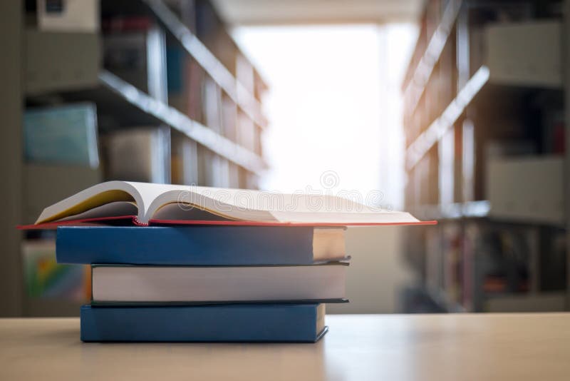 Open Book on Wood Desk in Library. Stock Photo - Image of modern, book ...