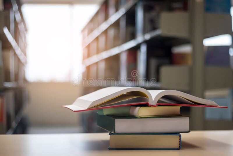 Open Book on Wood Desk in Library. Stock Photo - Image of novel ...