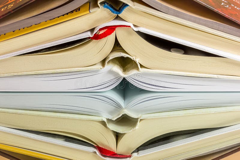 Open Books in a Pile Reflection Stock Image - Image of education ...