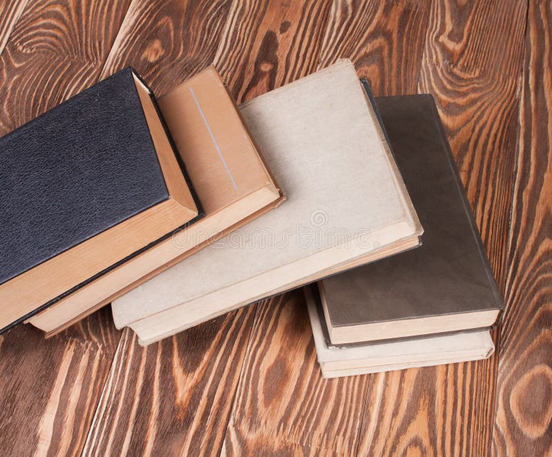 Open books on wood desk stock photo. Image of hardcover - 113204862