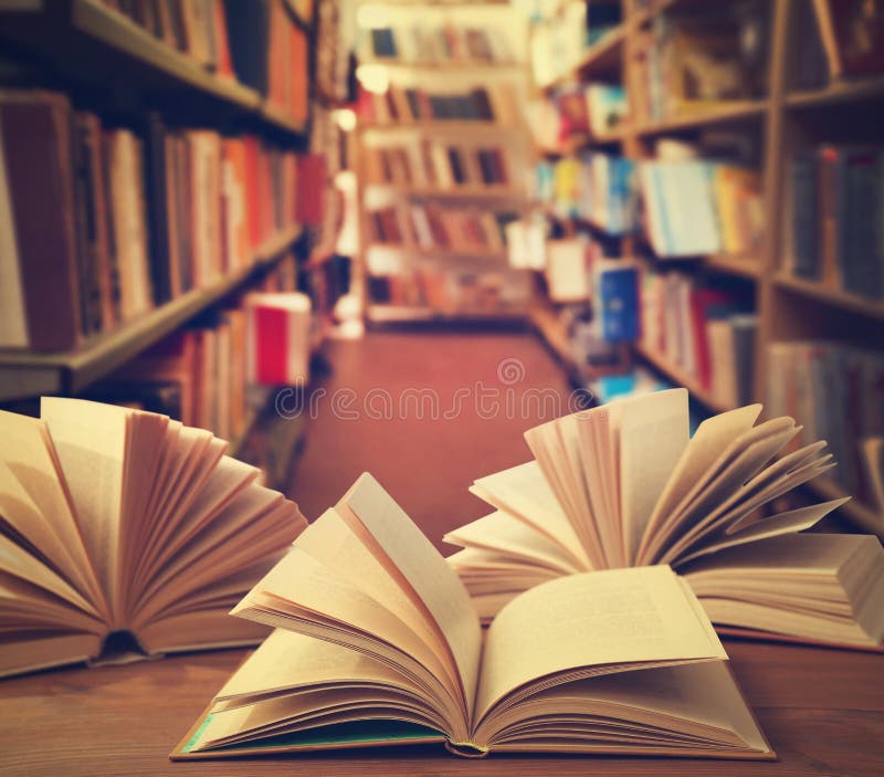 Open Books on Wooden Table in Library Stock Image - Image of library ...