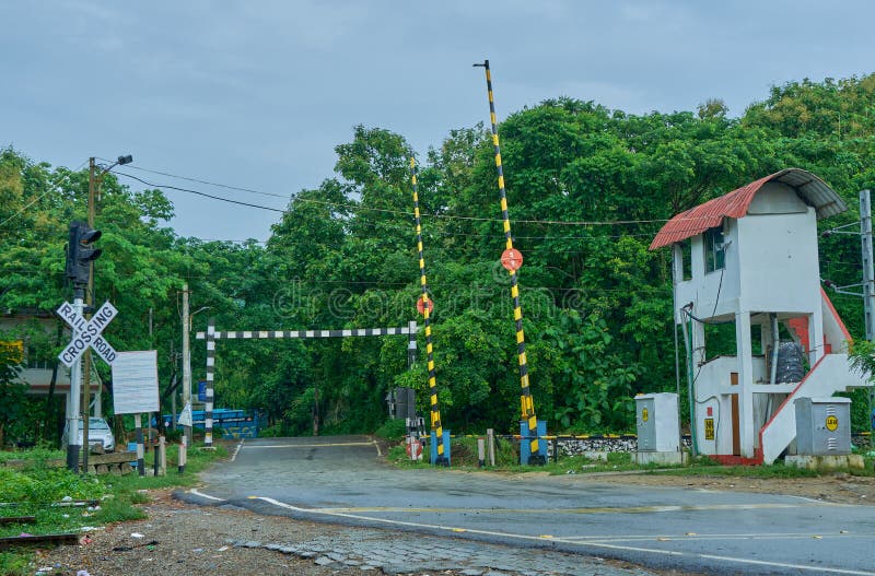 Railway level crossing editorial image. Image of vehicle - 339290955