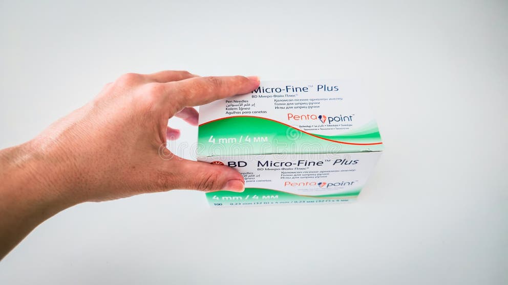 An Open Box of BD Micro-Fine Plus Pen Needles, Showing Green Plastic ...