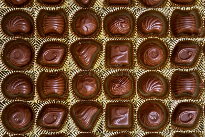 Open Box of Chocolate Treets Stock Photo - Image of indulgence, delight ...