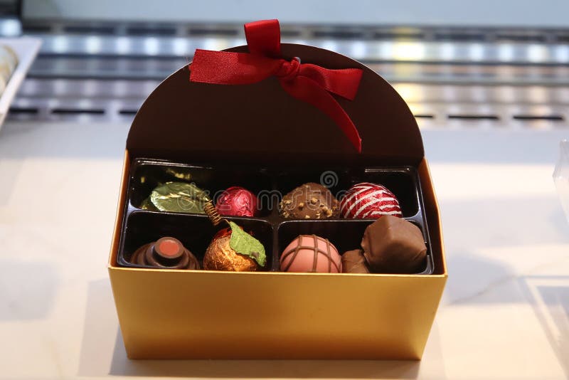 Open box of chocolates stock photo. Image of chocolate - 134963658