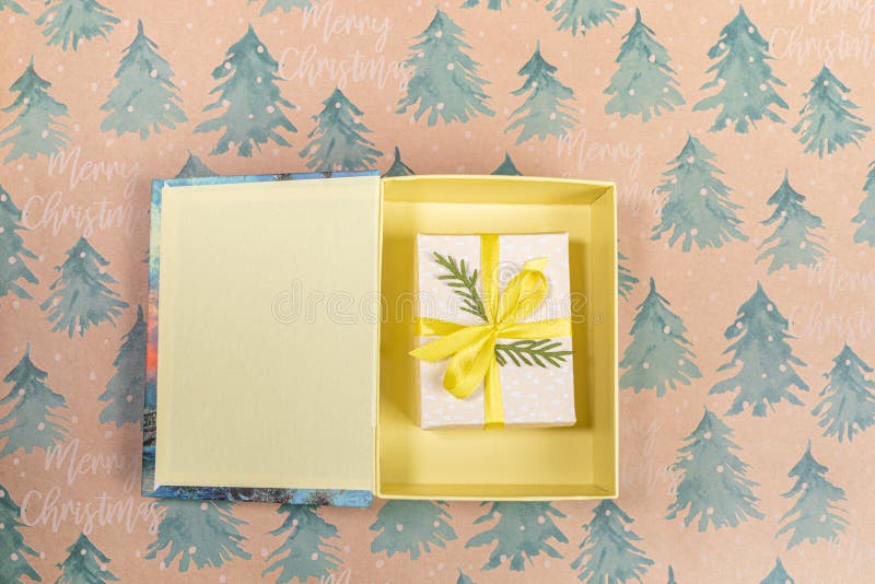 Open Box with Christmas DIY Wrapped Gift Box Inside it on Festive ...