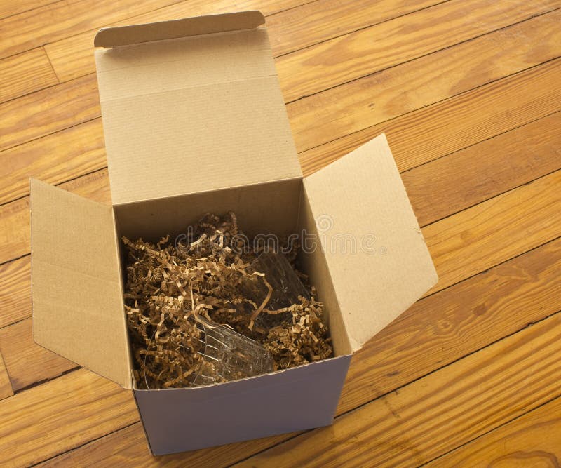 Open Box with Packing Paper Shreds Stock Image - Image of packed, grain ...