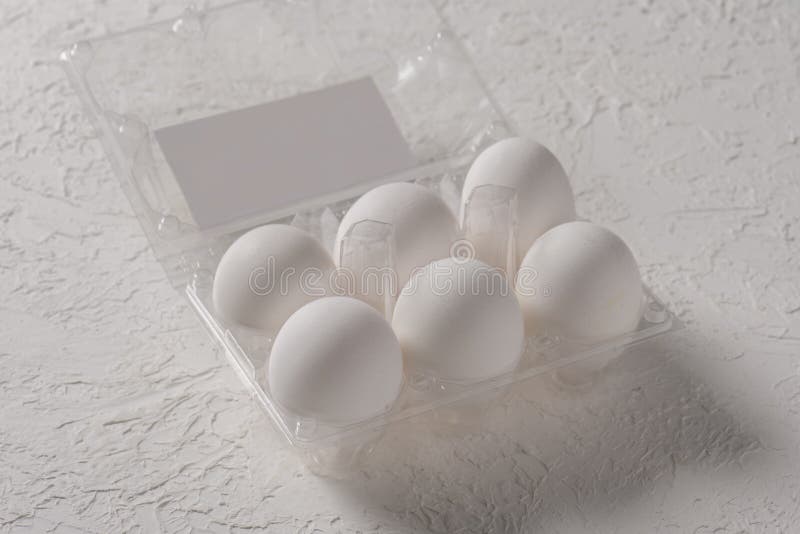 Open Box with Six Whole White Eggs on White Background with Clipping ...