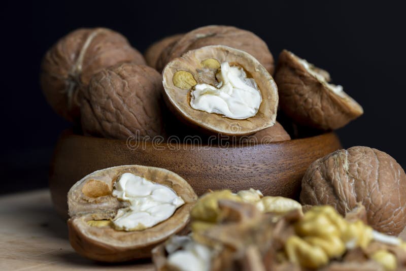 Open and Broken Walnut Shells Lying on the Table Stock Photo - Image of ...