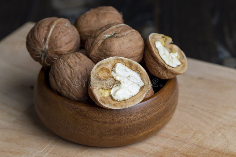 Open and Broken Walnut Shells Lying on the Table Stock Image - Image of ...
