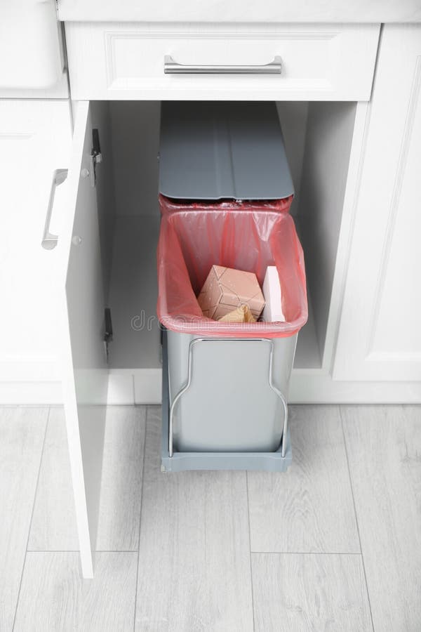 Open Cabinet with Full Trash Bin in Kitchen Stock Image - Image of ...