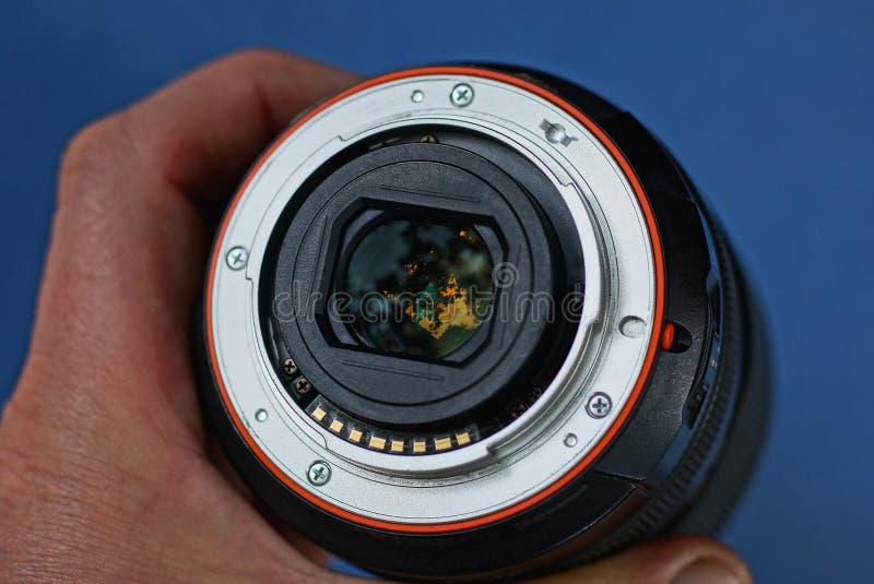 Lens in hand close up stock image. Image of hand, photographic - 83396535