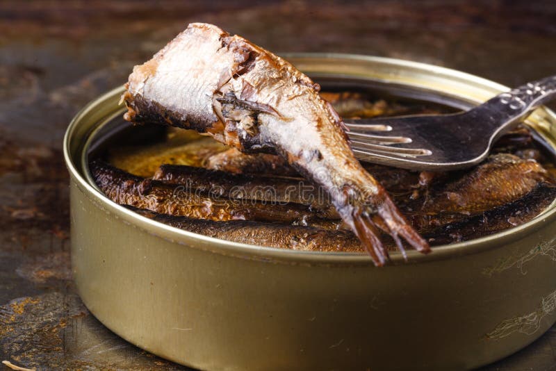 Open Canned Fish Near Fork on Rustic Background Stock Photo - Image of ...