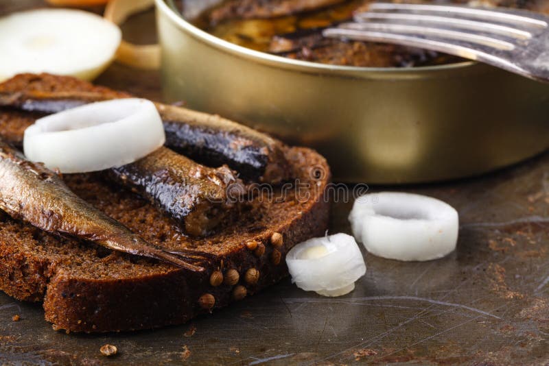 Open Canned Fish Near Fork on Rustic Background Stock Photo - Image of ...