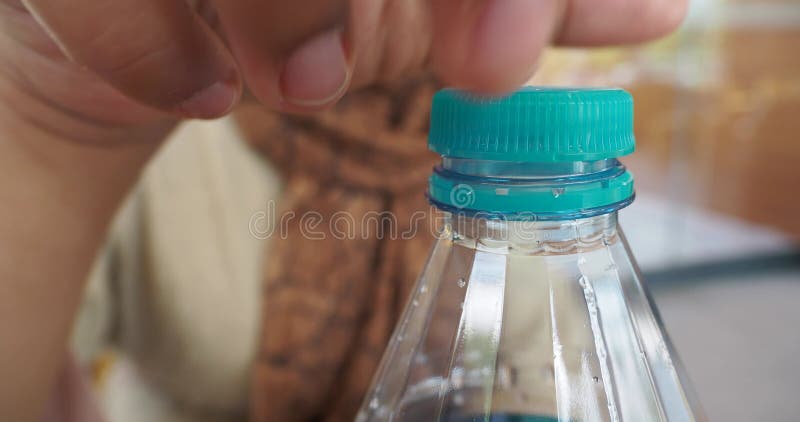 Open a Cap of a Plastic Water Bottle Stock Footage - Video of liter ...