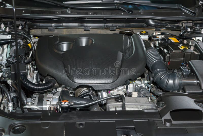 An Open Car Engine in a Workshop or Garage during Maintenance Stock ...