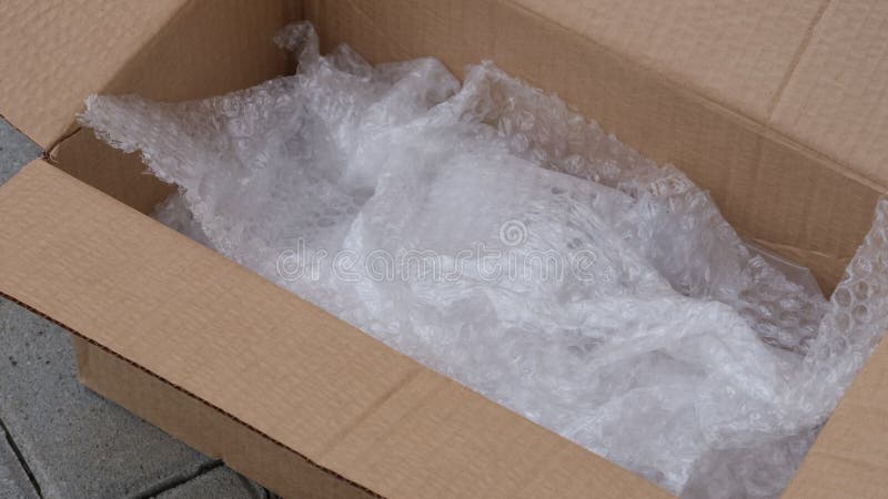 Open Cardboard Box with Bubble Wrap Inside. Stock Footage - Video of ...