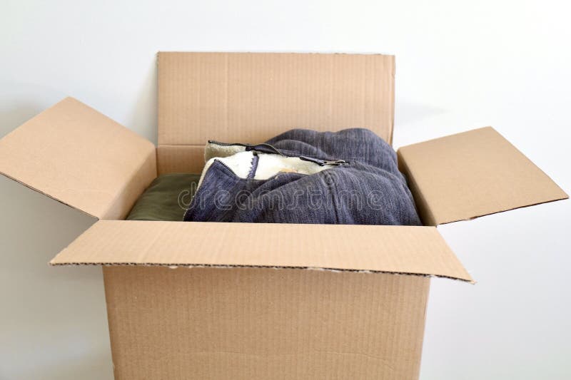 Open Cardboard Box with Clothes Stock Photo - Image of storage ...