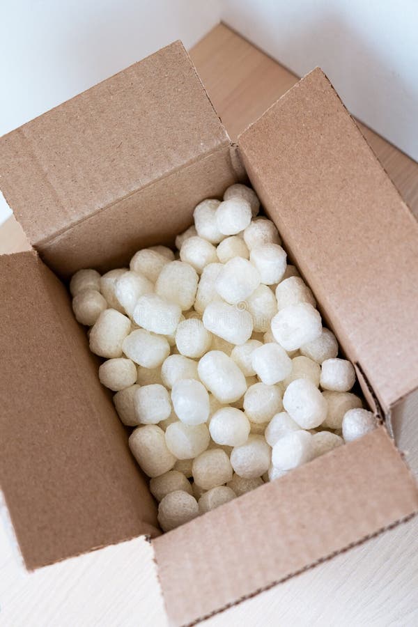 Open Cardboard Box Filled with Eco-friendly Corn-based Packing Peanuts ...