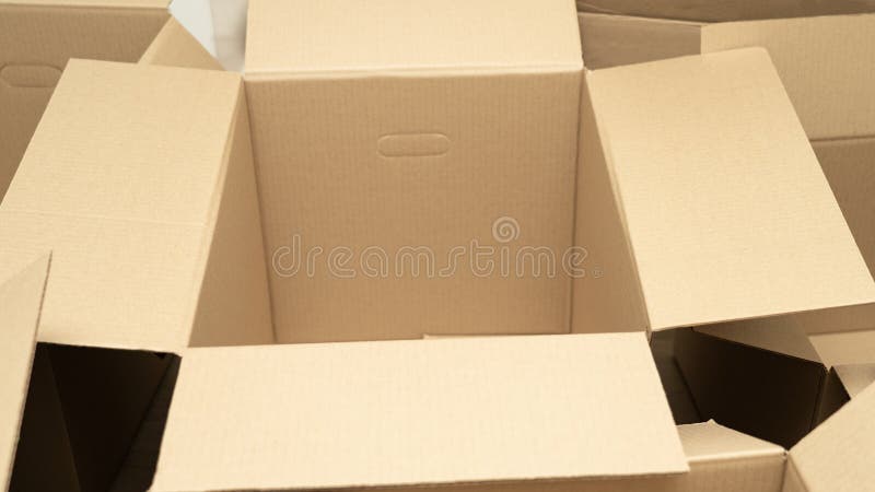 Open Cardboard Boxes Close-up, Cutout for Handle in Cardboard Box Stock ...