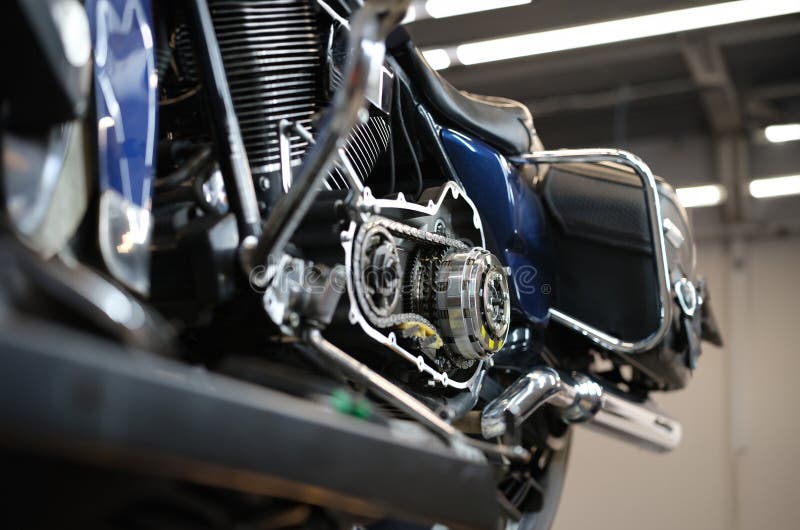 Open Chromed Motorcycle Motor with Chain on Bench in Garage Stock Photo ...