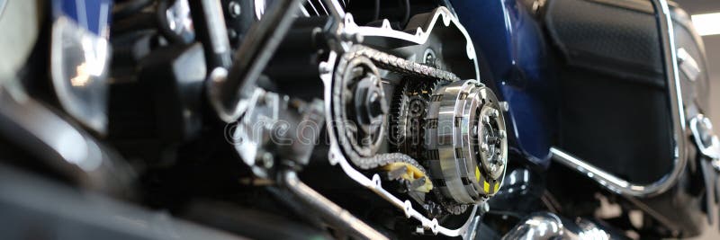 Open Chromed Motorcycle Motor with Chain on Bench in Garage Stock Photo ...