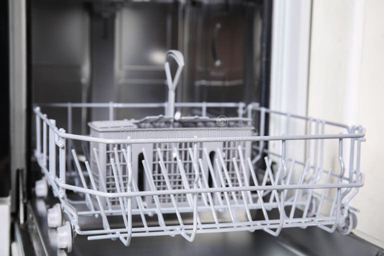 Open Clean Empty Dishwasher in Kitchen, Closeup Stock Photo - Image of ...