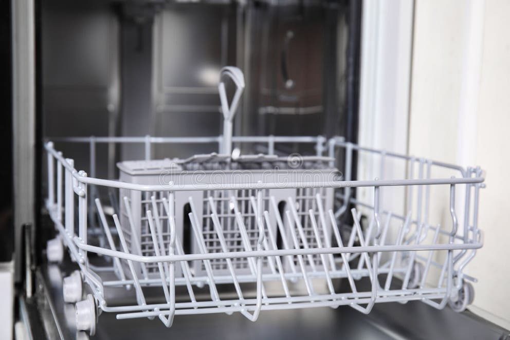 Open Clean Empty Dishwasher in Kitchen, Closeup Stock Photo - Image of ...