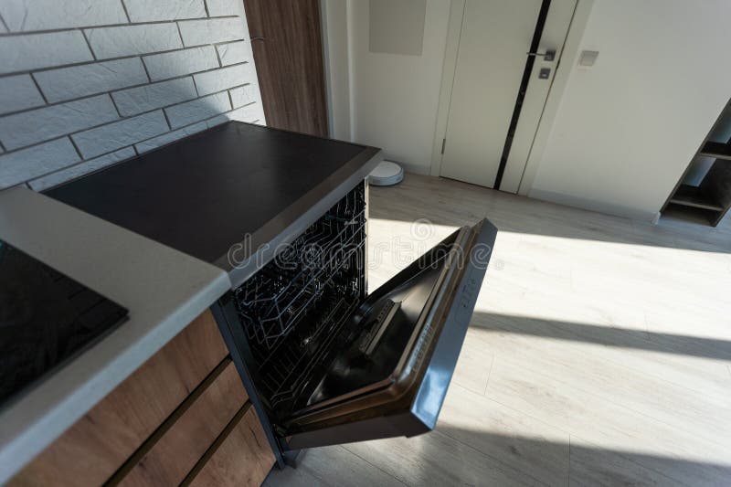 Open Clean Empty Dishwasher in Kitchen, Closeup Stock Photo - Image of ...