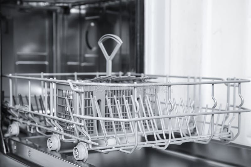 Open Clean Empty Dishwasher in Kitchen, Closeup Stock Photo - Image of ...