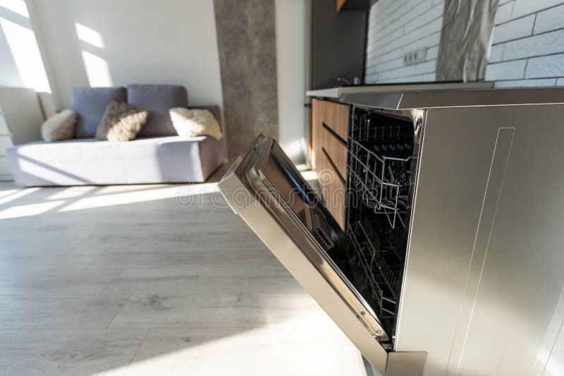 Open Clean Empty Dishwasher in Kitchen, Closeup Stock Image - Image of ...