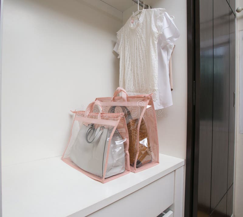 Open Closet with Clothes and Bags and Empty Space Stock Image - Image ...