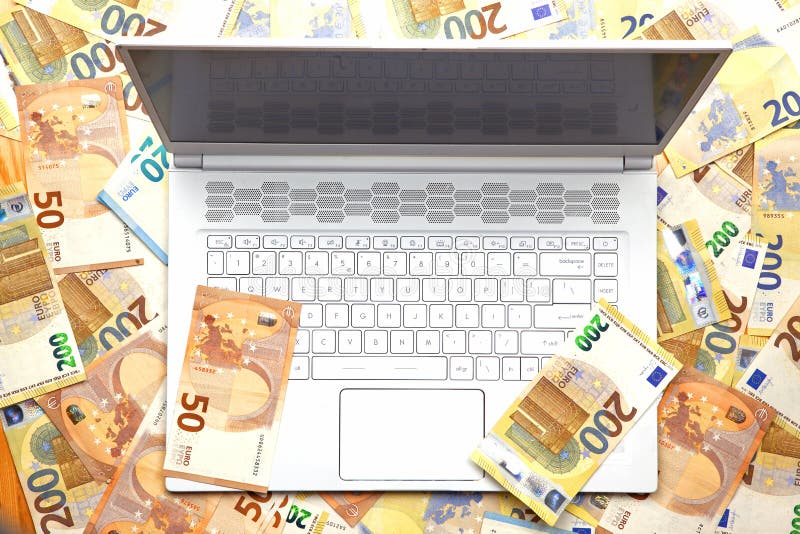 Open Computer and a Lot of Money Around Stock Image - Image of paper ...