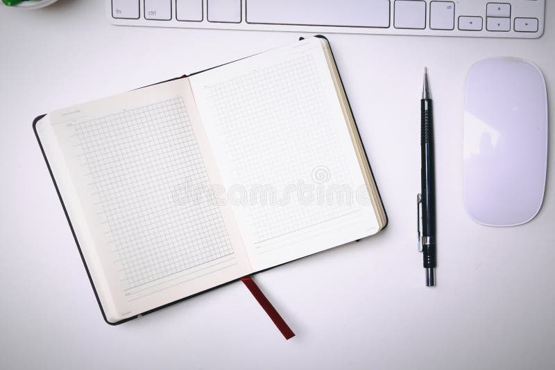 Open daily, a Computer and a Smartphone on the Desktop in the O Stock ...