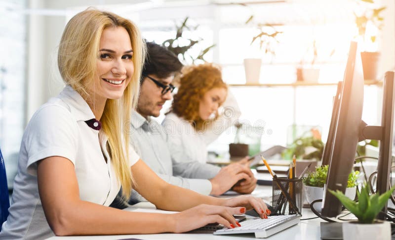 Open Concept Office with Young Employees Collaborating Stock Image ...