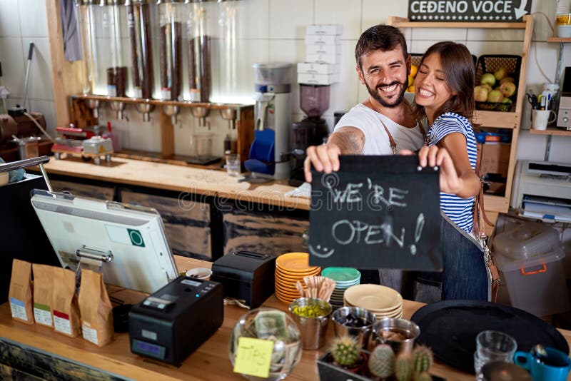 We are Open - Couple Opening Their Coffee Shop Stock Photo - Image of ...
