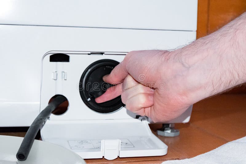 Open Cover of Washing Machine Filter. Repair Work of the Washing ...