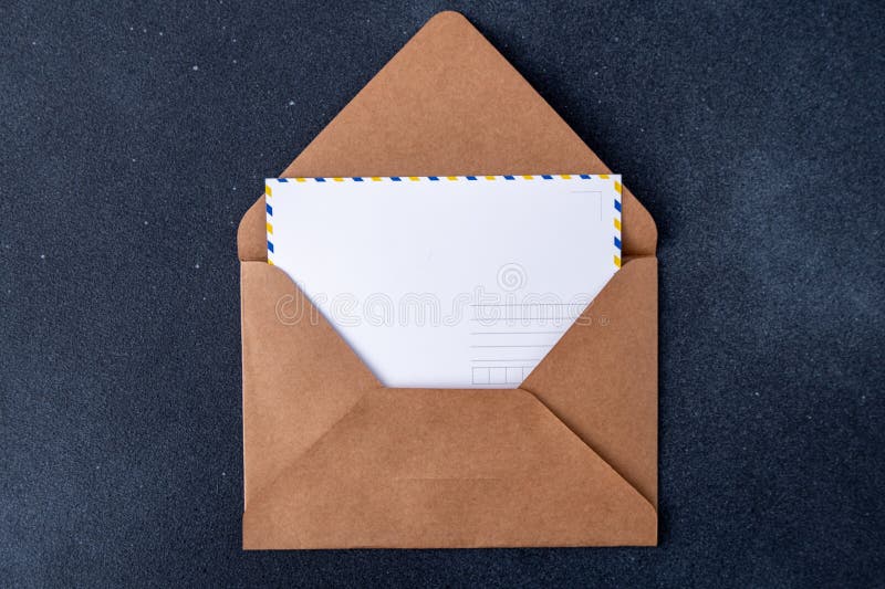 Open Craft Brown Envelope and Postcard Form. Letter with Copy Space ...