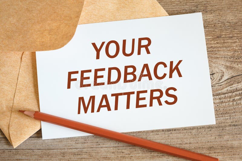 Open Craft Envelope and Card with the Words YOUR FEEDBACK MATTERS Stock ...