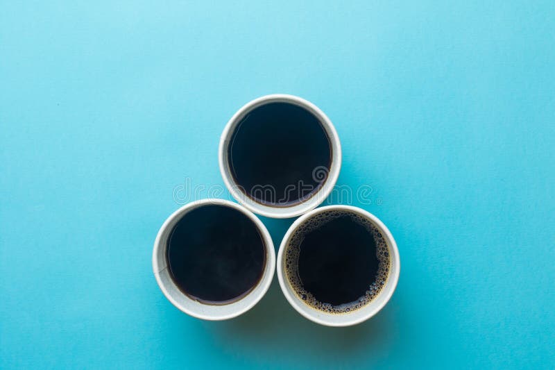 Open cups of black coffee stock photo. Image of paper - 272290646