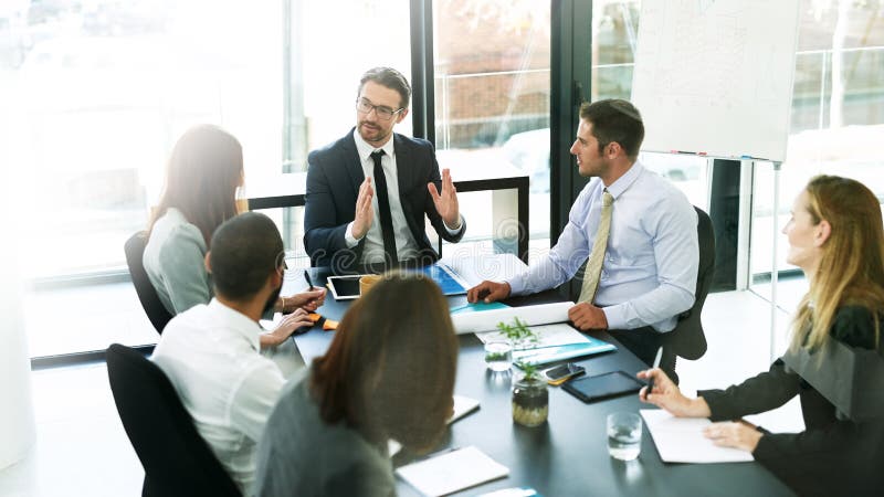 An Open Dialogue Makes for a Productive Meeting. a Team of Executives ...