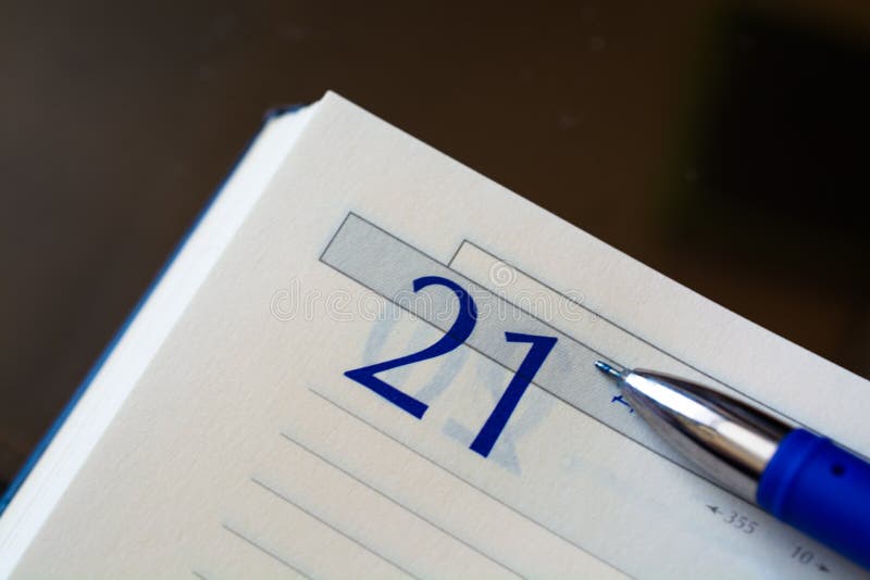 Open Diary Notebook with a Pen. Open on a Sheet with Date 21 Stock ...