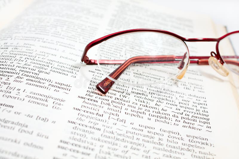 Open Dictionary Book and Glass Stock Photo - Image of book, dictionary ...
