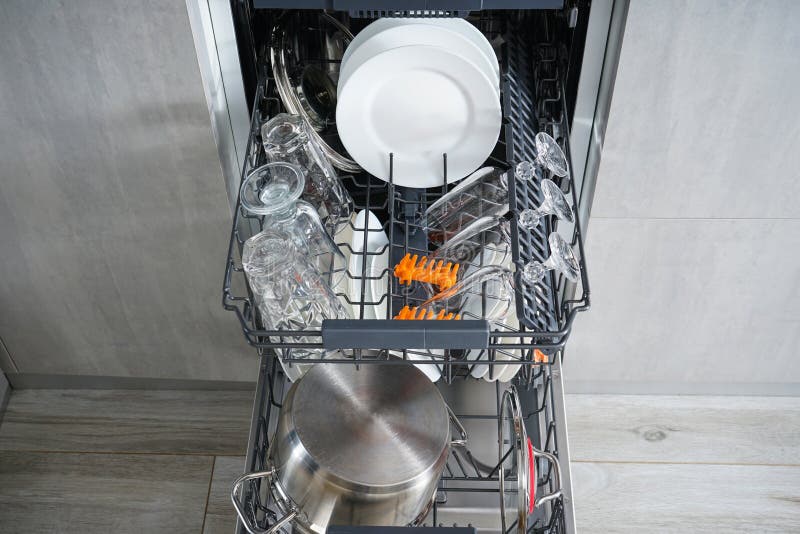 Dishwasher Front View. Clean Dishes in the Dishwasher Close-up Stock ...