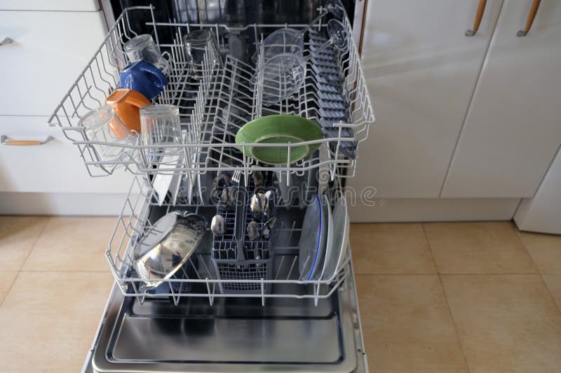 Open Dishwasher with Clean Dishes and Utensils in Modern Kitchen Stock ...