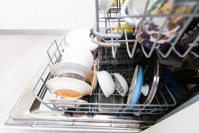 Open Dishwasher with Clean Dishes in the White Kitchen Stock Image ...